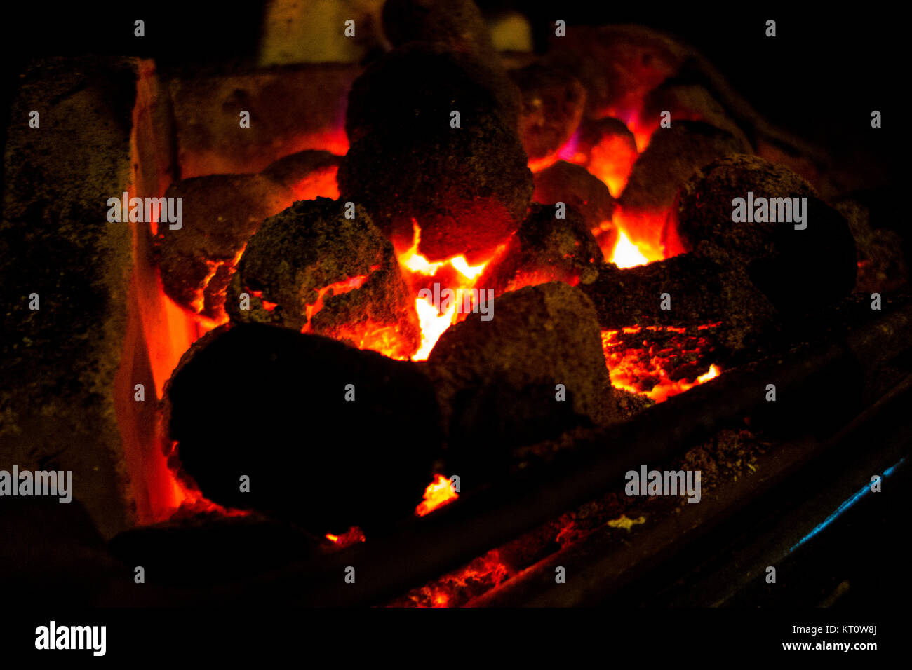 Burning Coke Coals on a Fireplace Stock Photo - Alamy