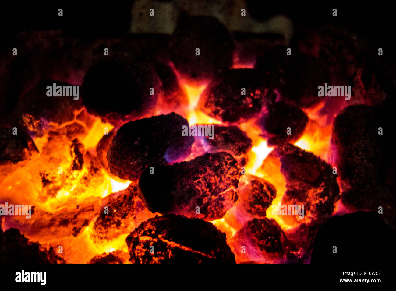 Burning Coke Coals on a Fireplace Stock Photo - Alamy