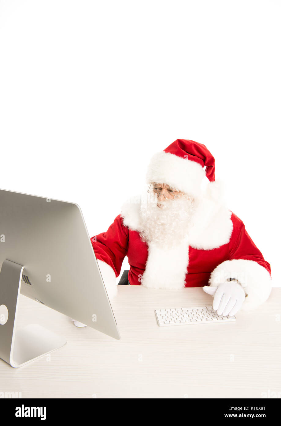 Santa Claus using computer Stock Photo - Alamy