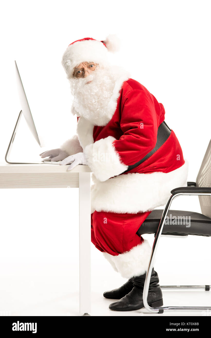 Santa Claus using computer Stock Photo - Alamy