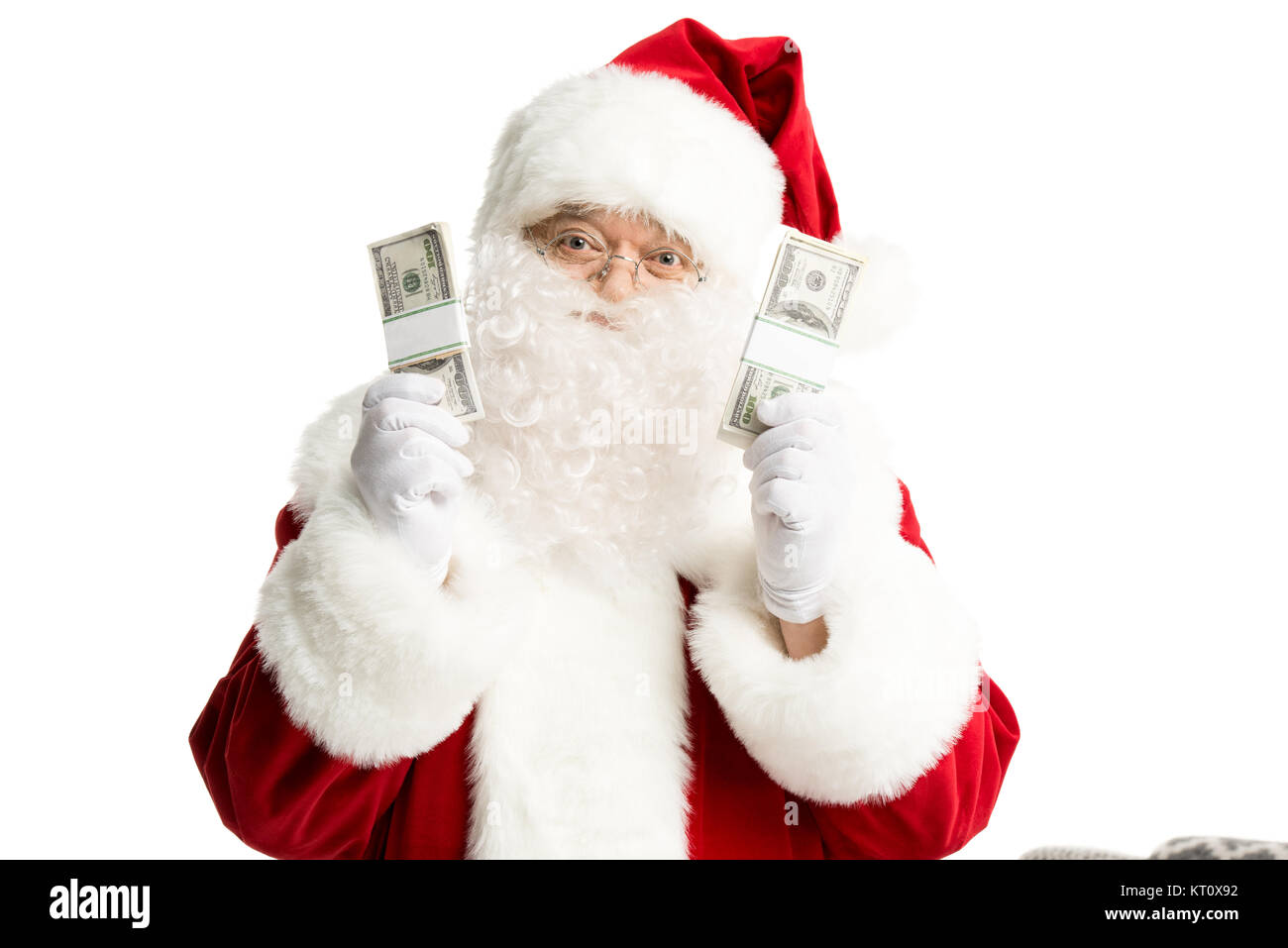 Happy Santa Claus showing dollars Stock Photo - Alamy