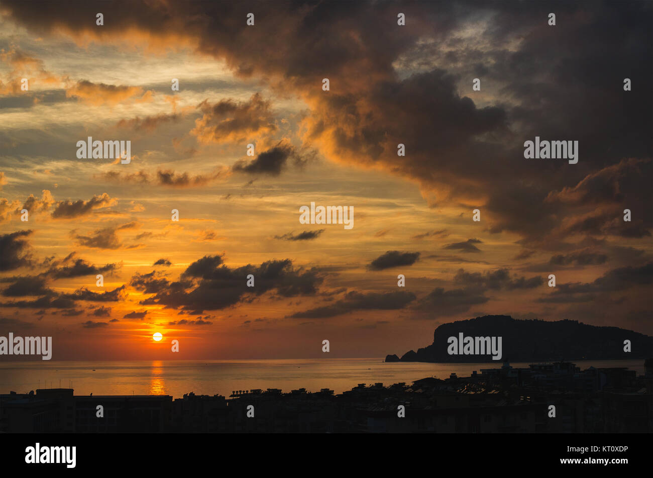 View from balcony of romantic sunset over sea and evening dramatic sky ...