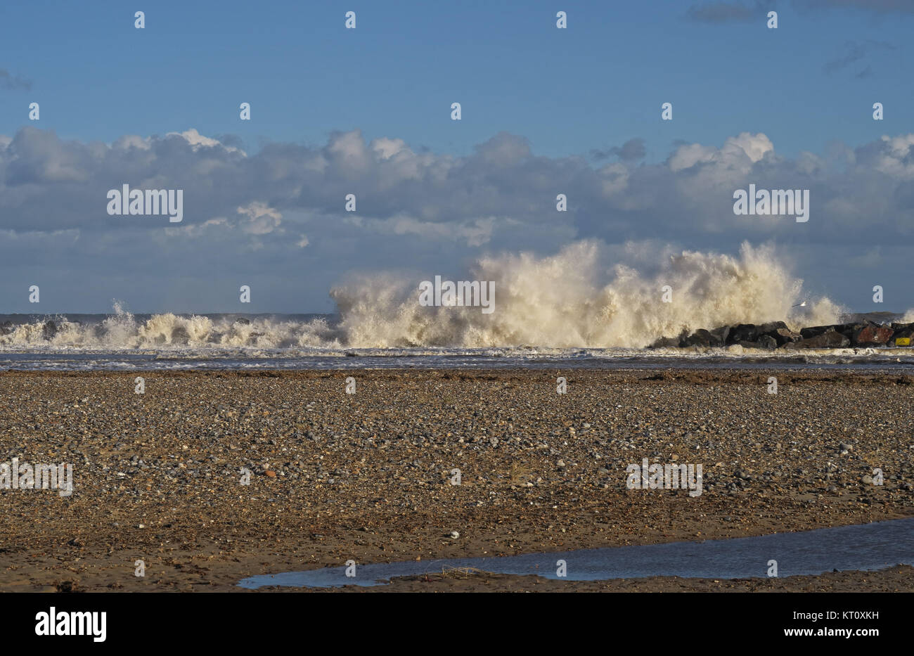 waves breaking on sea defence offshore reef Eccles-on-Sea, Norfolk, UK ...
