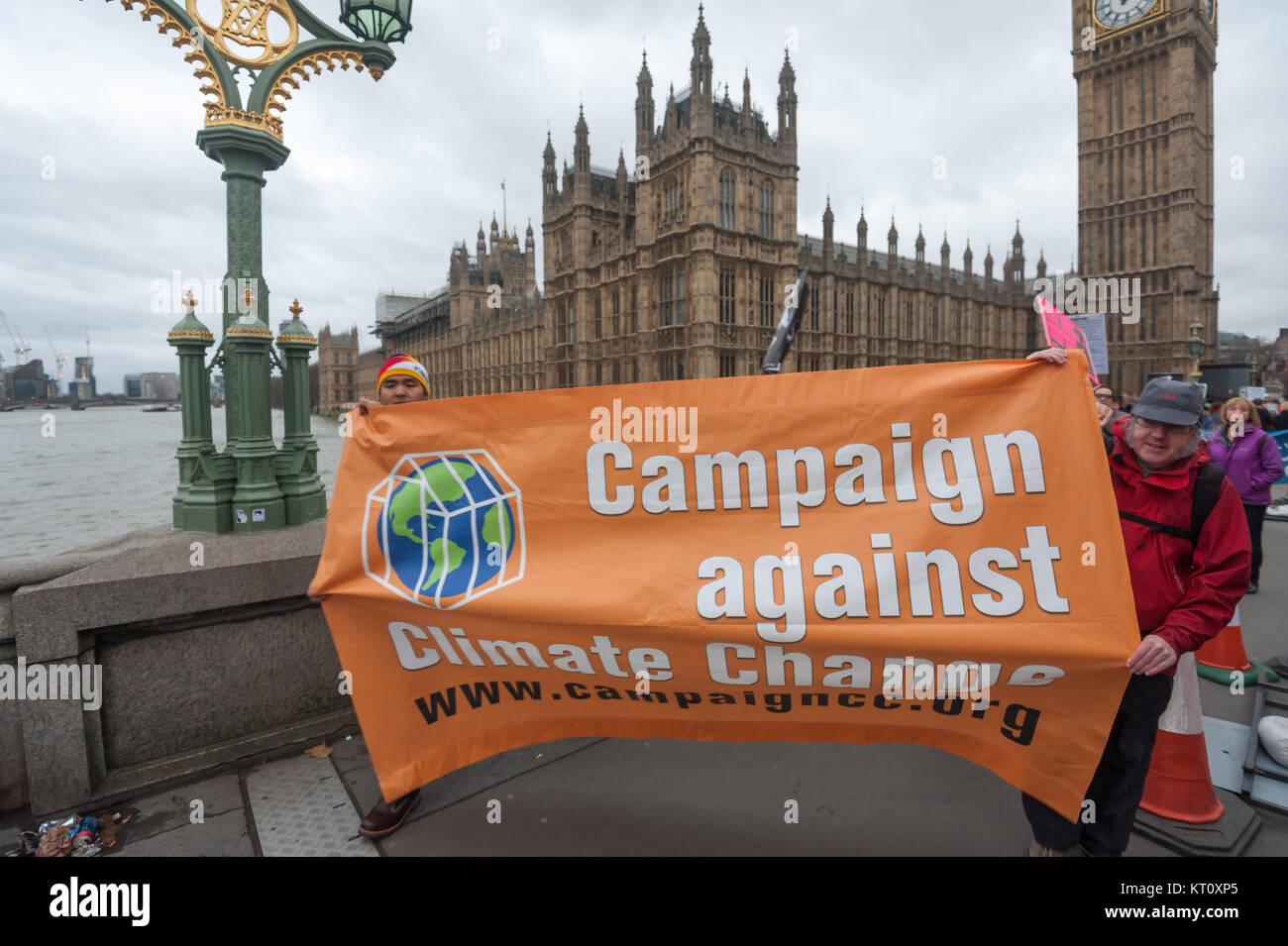 Campaign Against Climate Change banner on Westminster Bridge in front ...