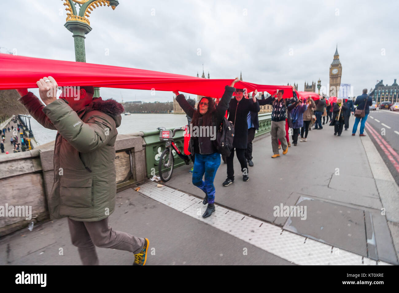 People carry a 'red line' across Westminster Bridge in Campaign Against ...