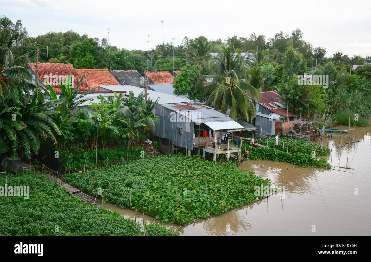 An Giang, Vietnam - Oct 3, 2015. Many houses located riverbank in An ...