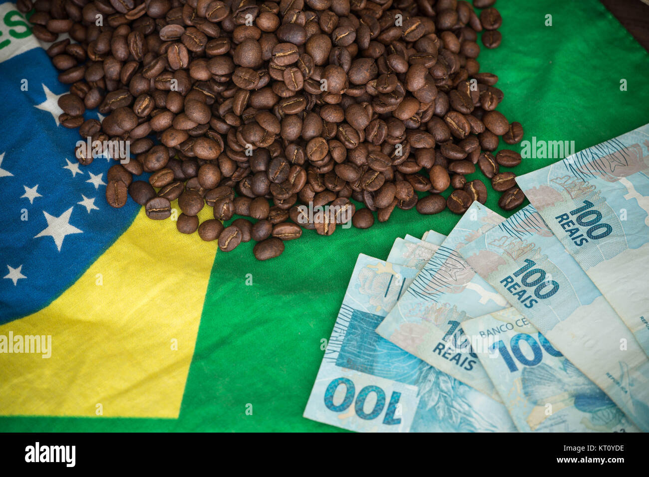 Coffee beans and Brazilian money Stock Photo - Alamy