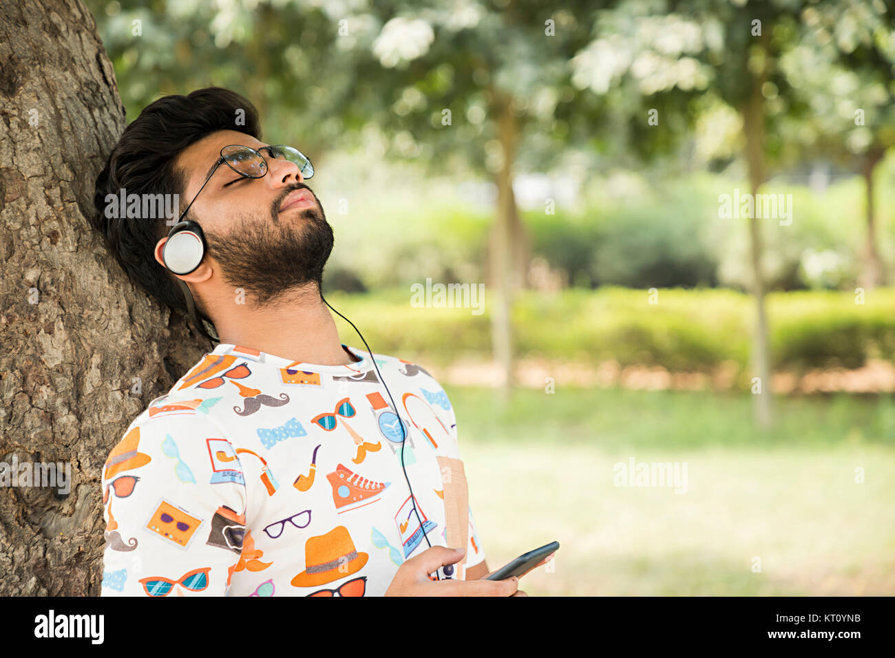 college boy in a park Stock Photo - Alamy