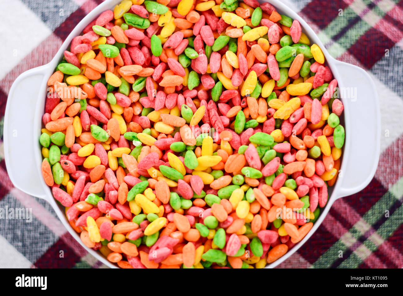 Puffed crispy colorful rice in the bowl Stock Photo - Alamy
