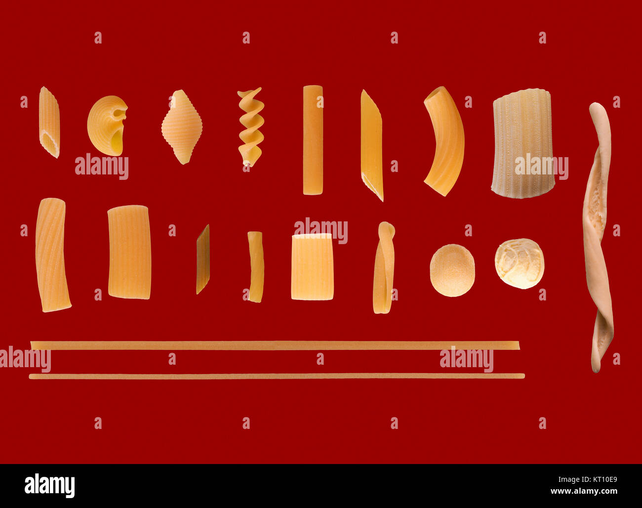Traditional Italian pasta, dark red background Stock Photo - Alamy