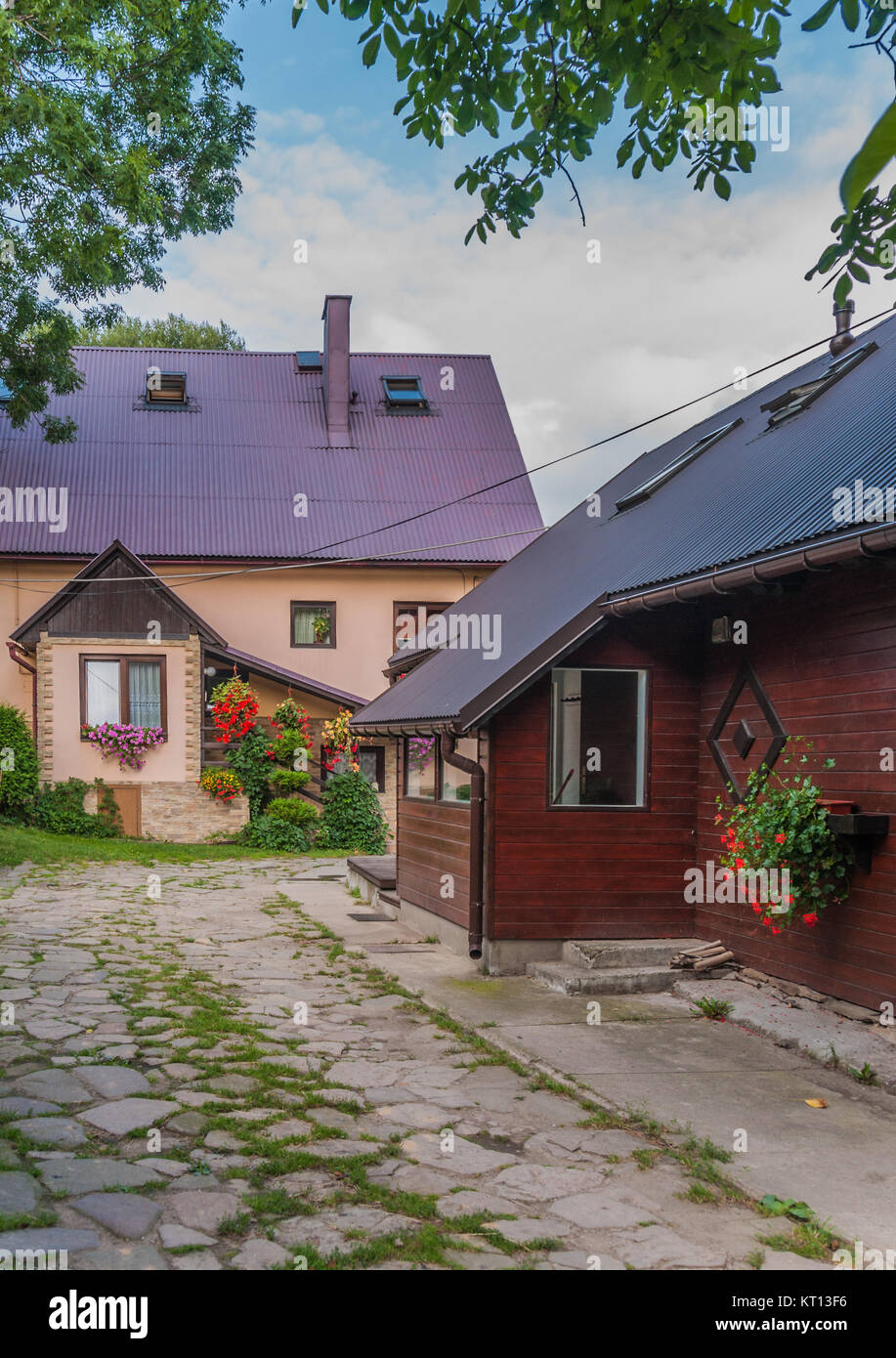 Two country houses in the same yard inhabited by good neighbours. Warm ...