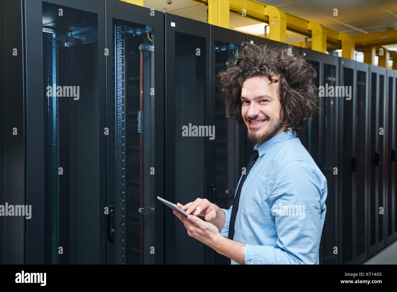 Young technician working Stock Photo - Alamy