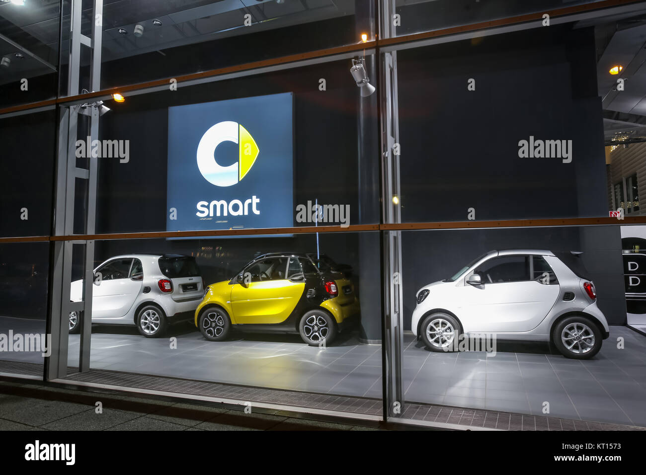MUNICH, GERMANY - DECEMBER 11, 2017 : Three Smart automobiles exhibited ...