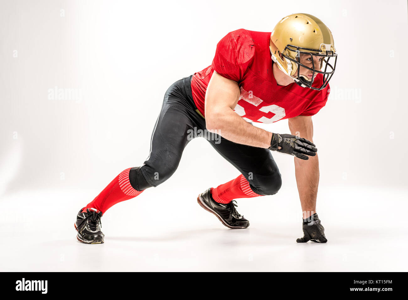 Football player in protective sportswear Stock Photo - Alamy