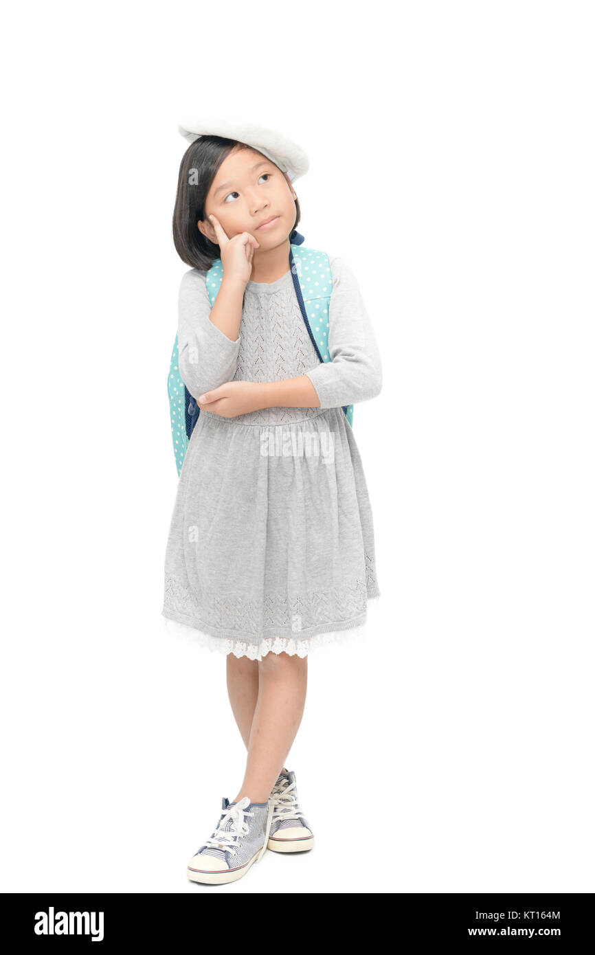 cute asian little girl stand thinking Isolated on white background ...
