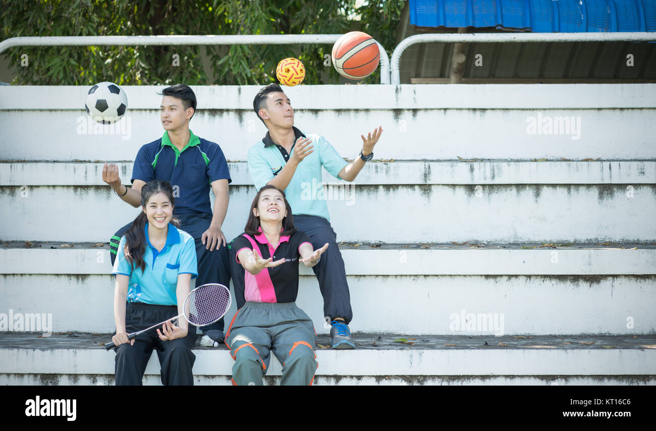 group of young students play sport on amphitheater, healthy concept ...