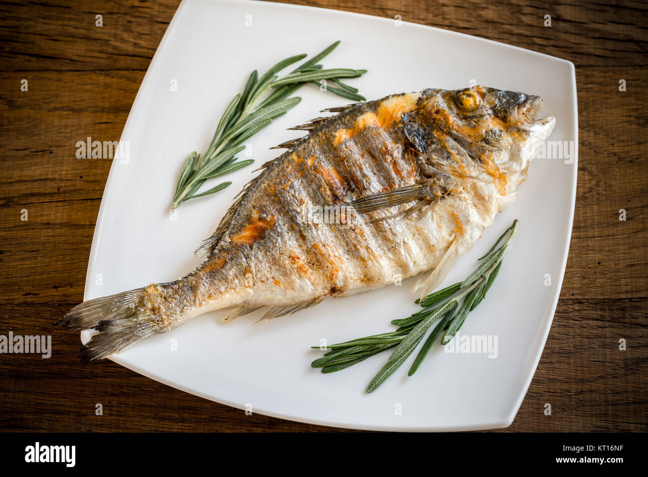 Grilled dorada fish Stock Photo - Alamy