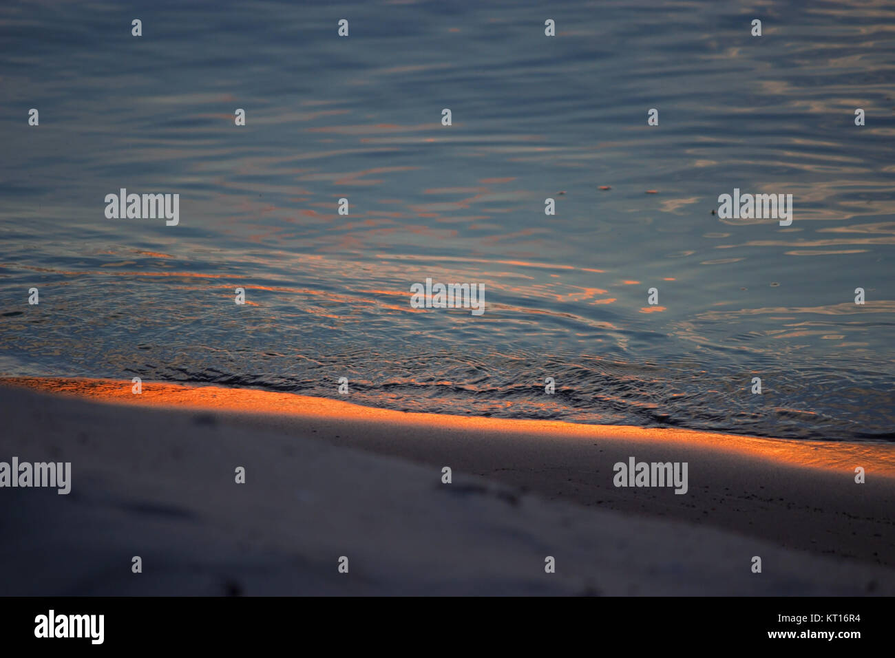 sun reflecting in the waves Stock Photo - Alamy