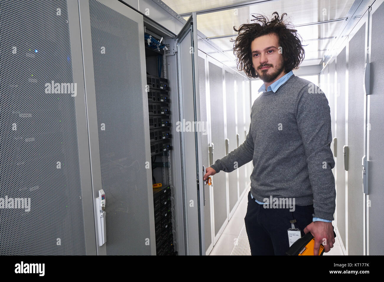 Young technician working Stock Photo - Alamy
