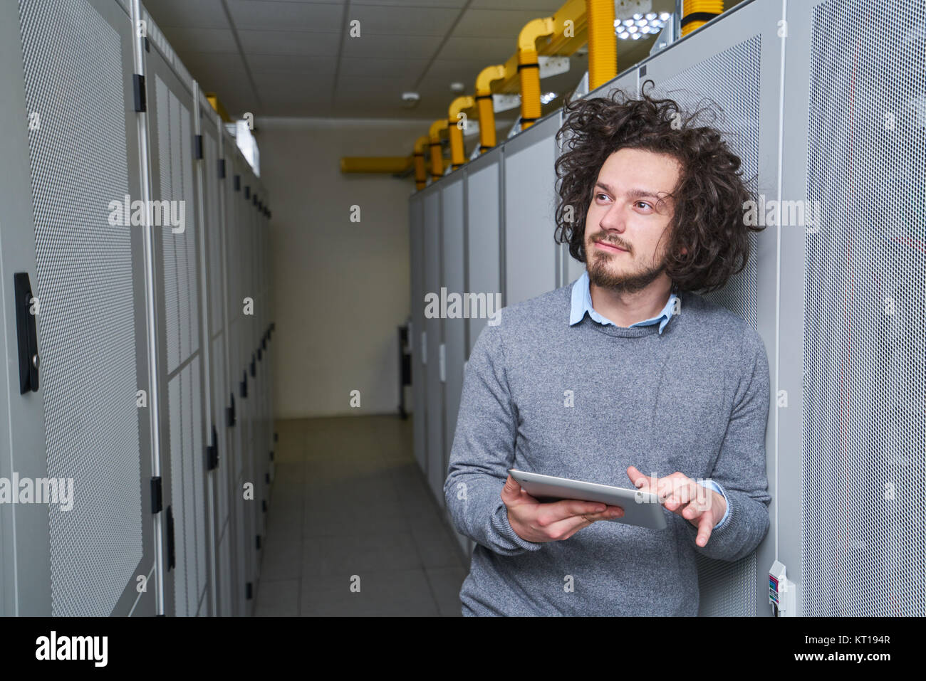 Young technician working Stock Photo - Alamy