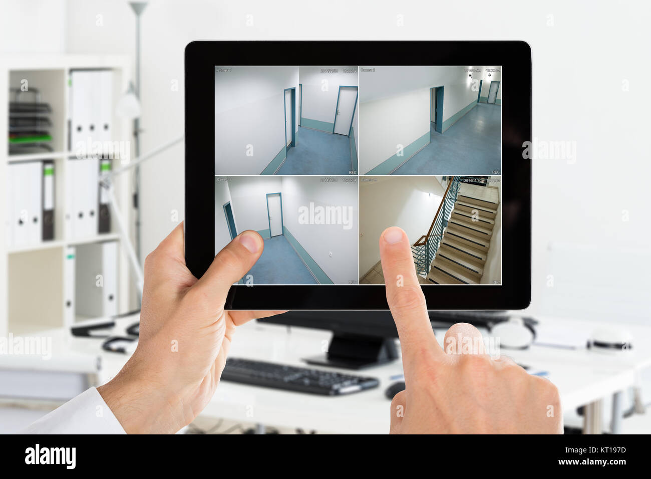 Man Looking At Home Camera CCTV Videos Stock Photo - Alamy