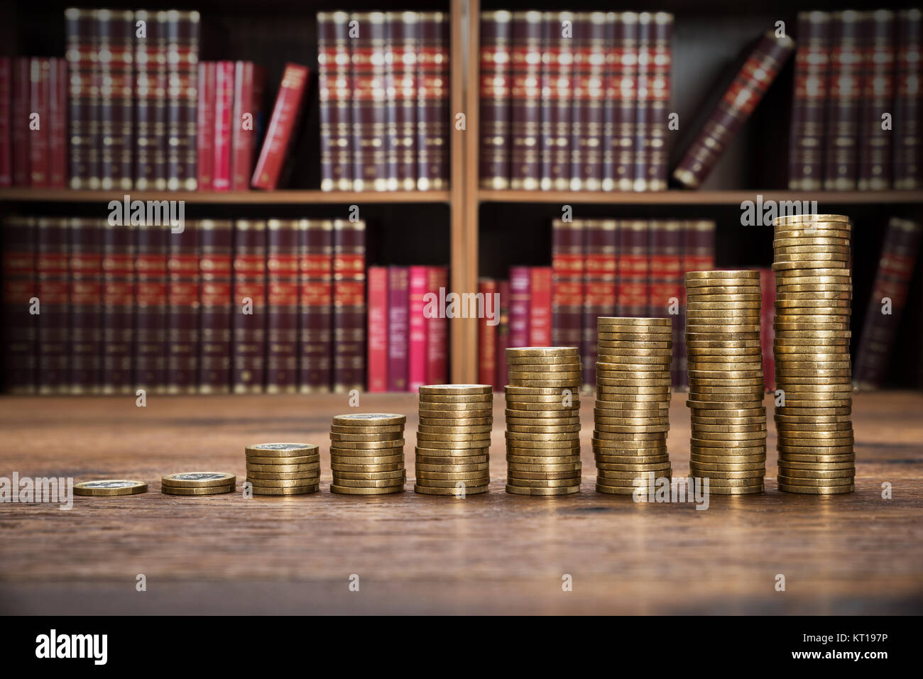 Coins Stack On Table Stock Photo - Alamy