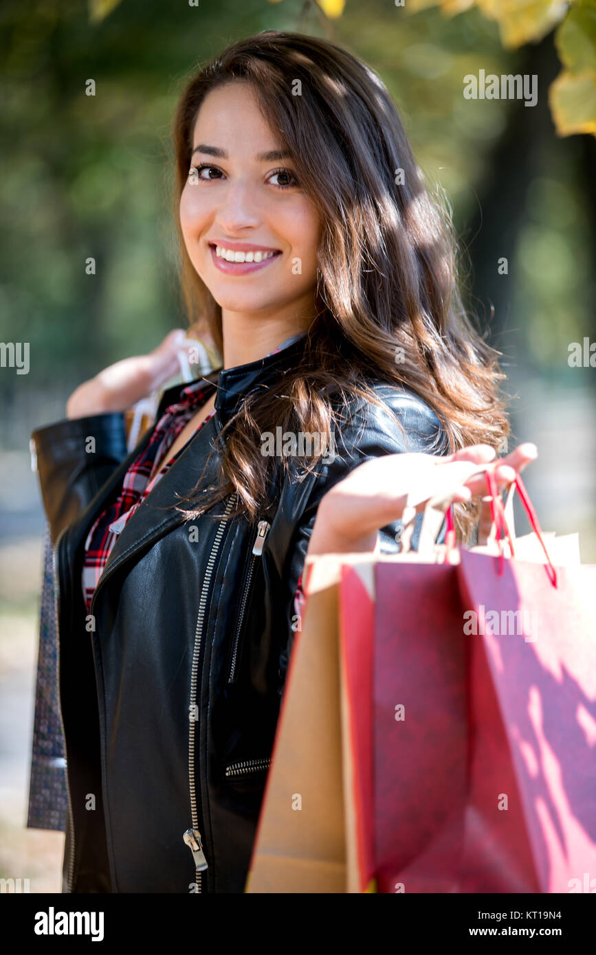 Pretty girl with shopping bags having fun, shopper, shopaholic Stock ...