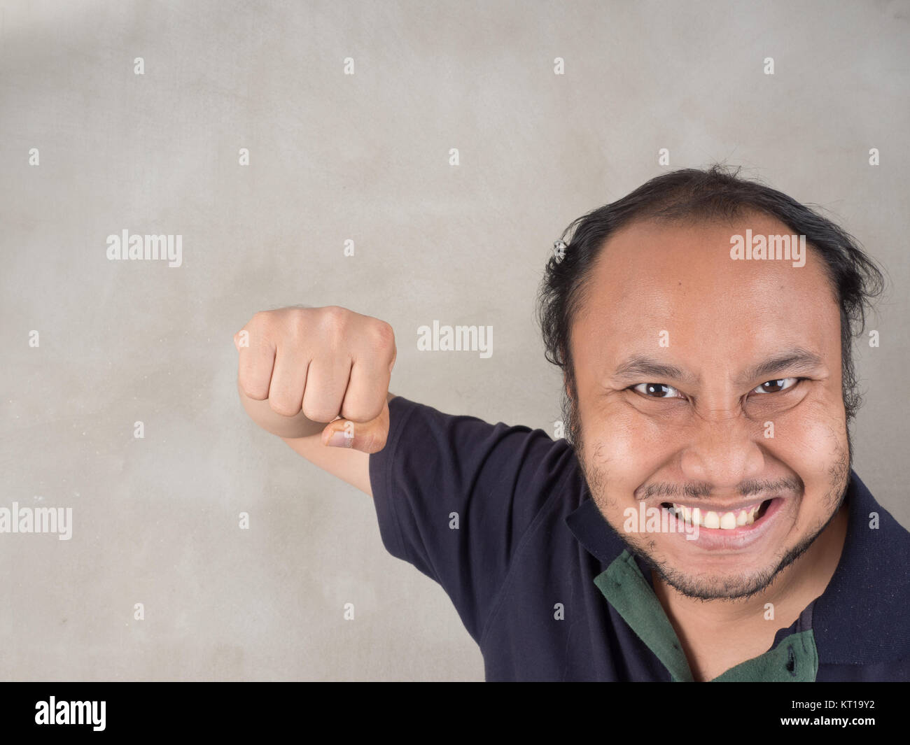 Young aggressive man showing hi-res stock photography and images - Alamy