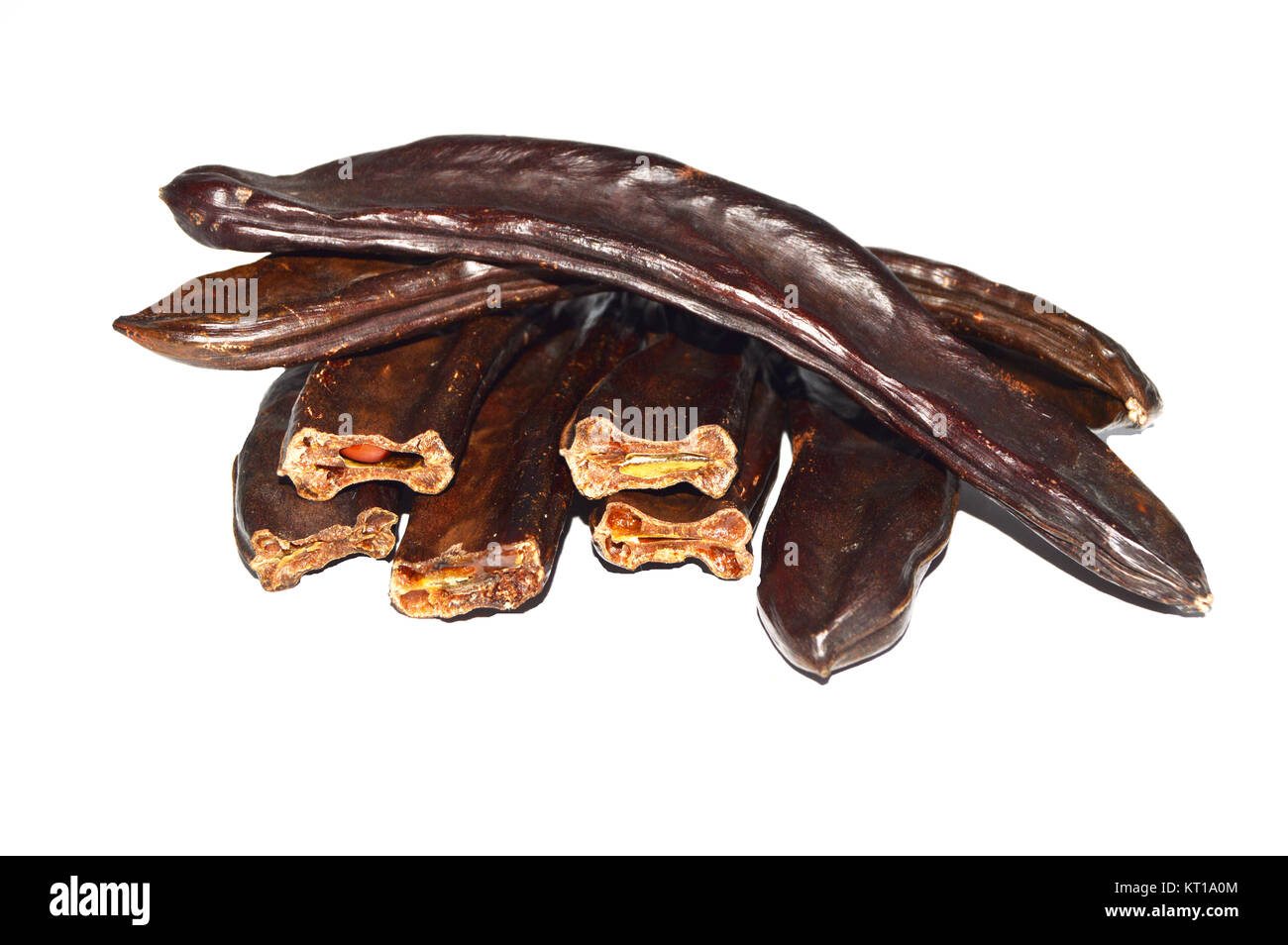 Dried carob fruit close up Cut Out Stock Images & Pictures - Alamy