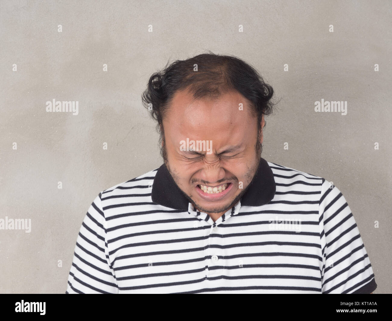 man with stressed face Stock Photo - Alamy