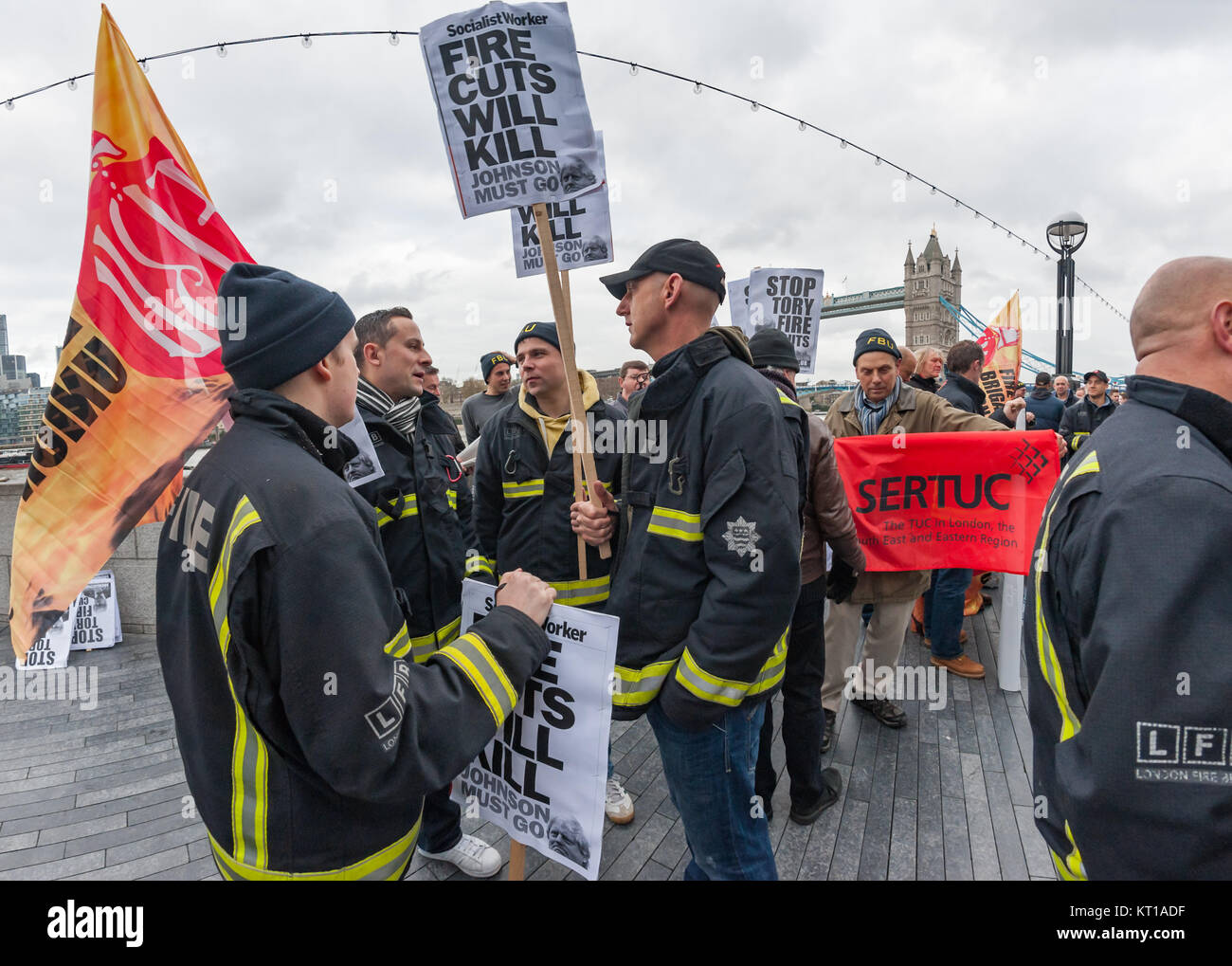 Fire fighters at protest outside City Hall against proposed cutting of ...