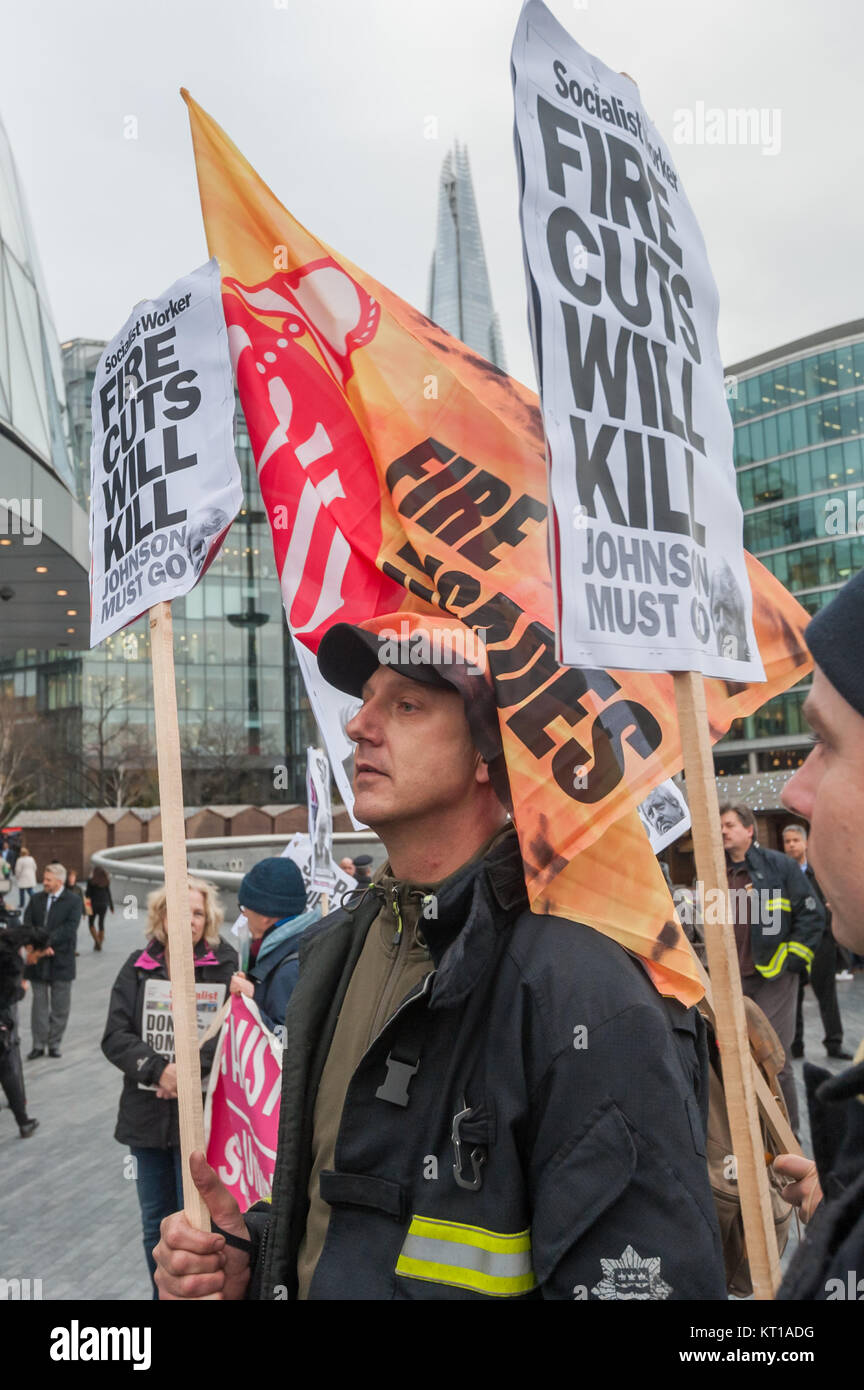 Fire fighters at protest outside City Hall against proposed cutting of ...