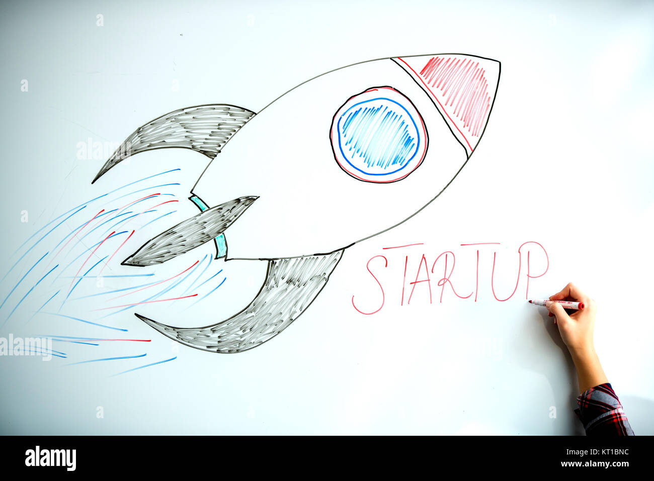 Startup rocket on whiteboard, concept Stock Photo - Alamy