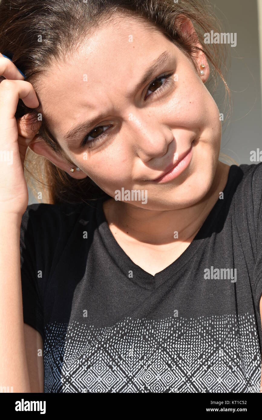 Confused Hispanic Female Stock Photo - Alamy