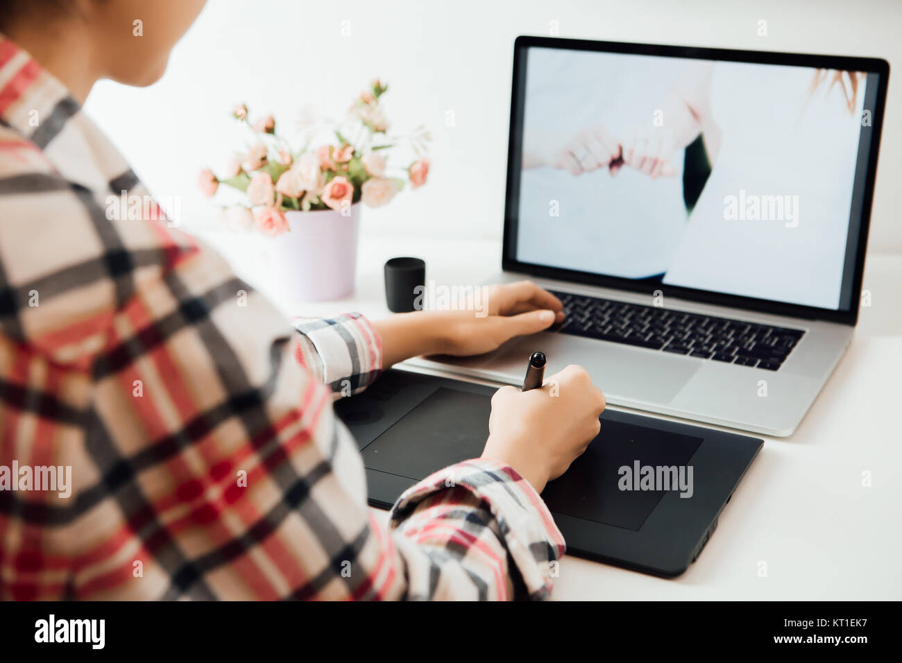 retouching on computer laptop Stock Photo - Alamy