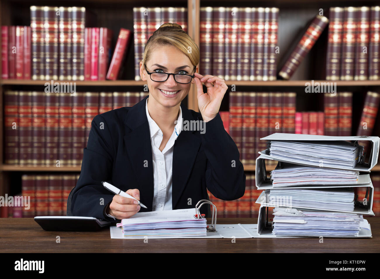 Beautiful female accountant analyzing hi-res stock photography and ...