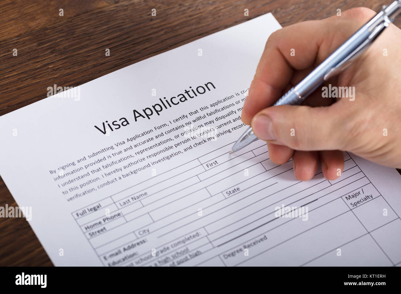 Application form filling people pencil hi-res stock photography and ...
