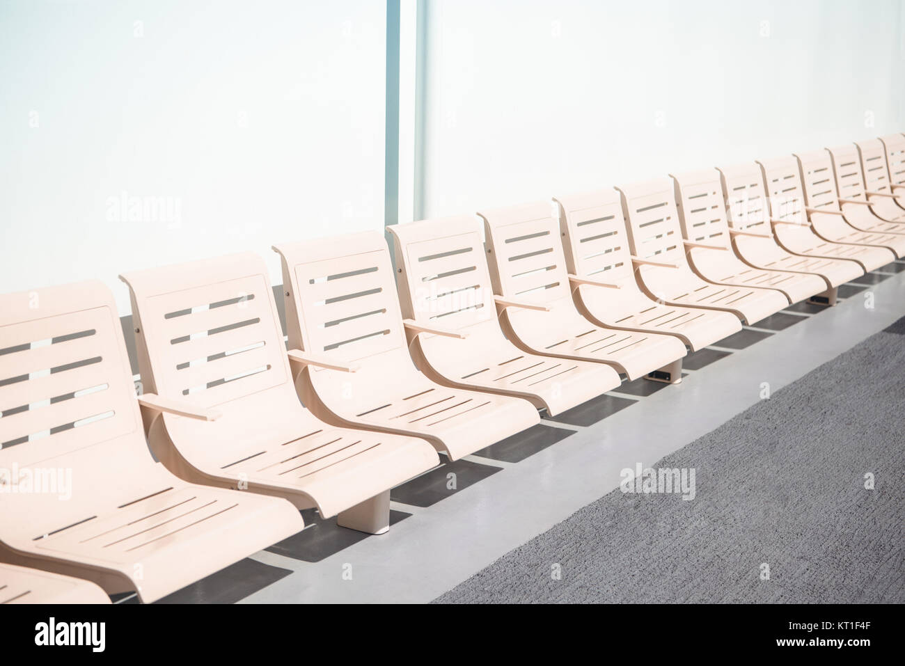 Row plastic chairs room hi-res stock photography and images - Alamy