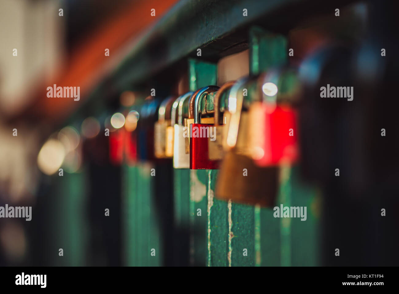 Colorful locks on a bridge, put there by couples in love. Taken in ...