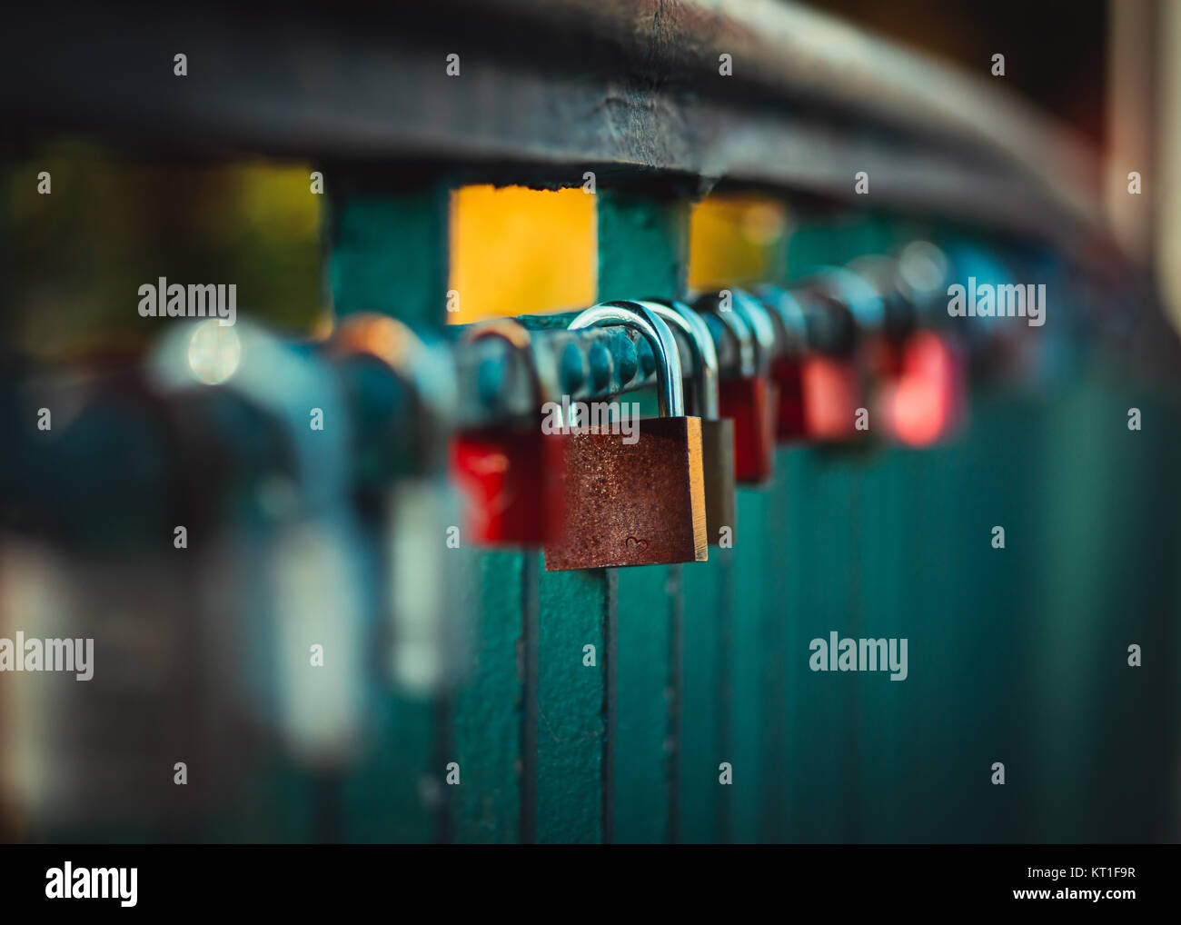 Colorful locks on a bridge, put there by couples in love. Taken in ...