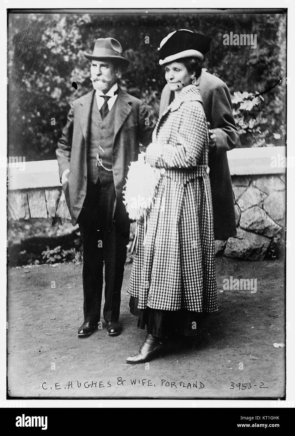 This image shows C.E. Hughes and his wife in Portland, Oregon, likely capturing a moment of ...