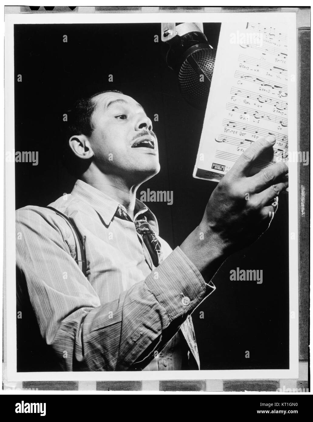 This image captures a portrait of Cab Calloway, the famous jazz singer ...