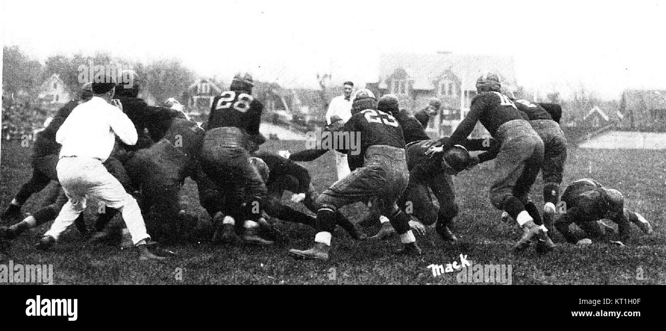 In the 1922 game, Cappon runs for a touchdown against the Aggies ...