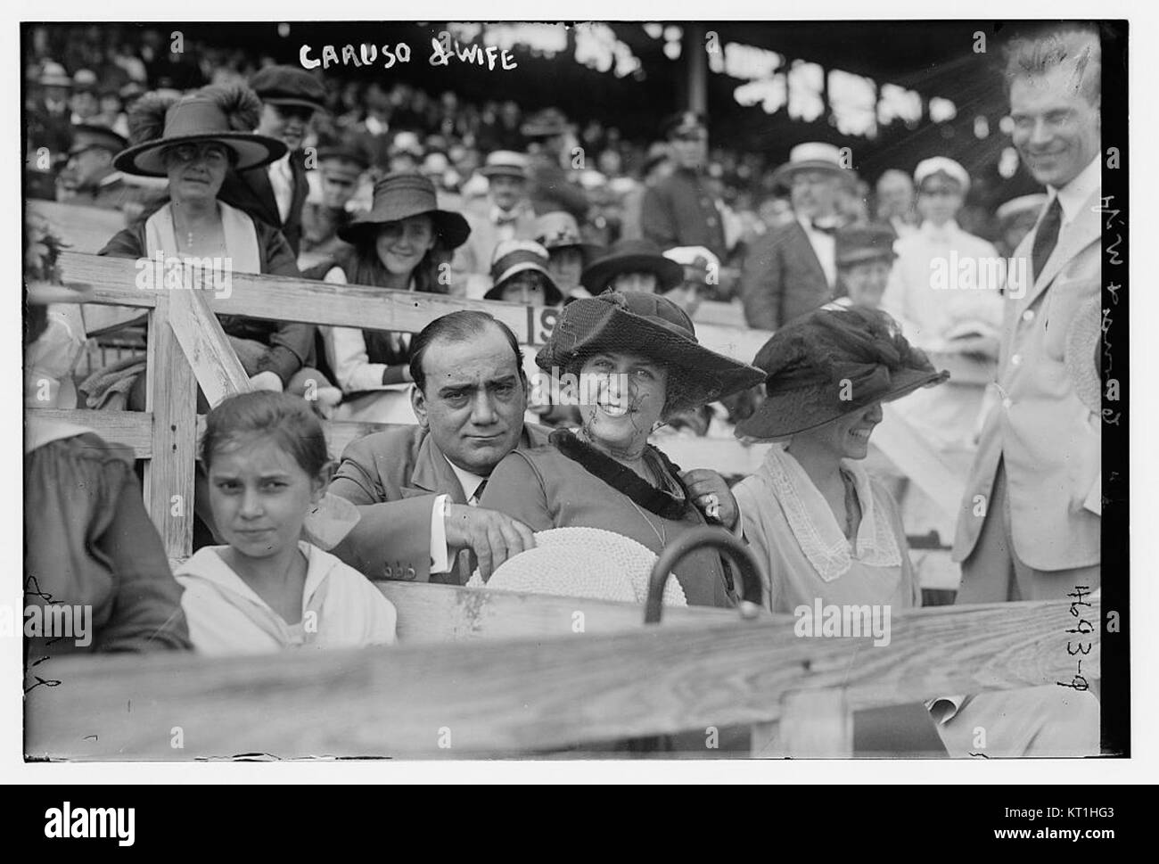 This photo captures the famous opera singer Enrico Caruso with his wife ...