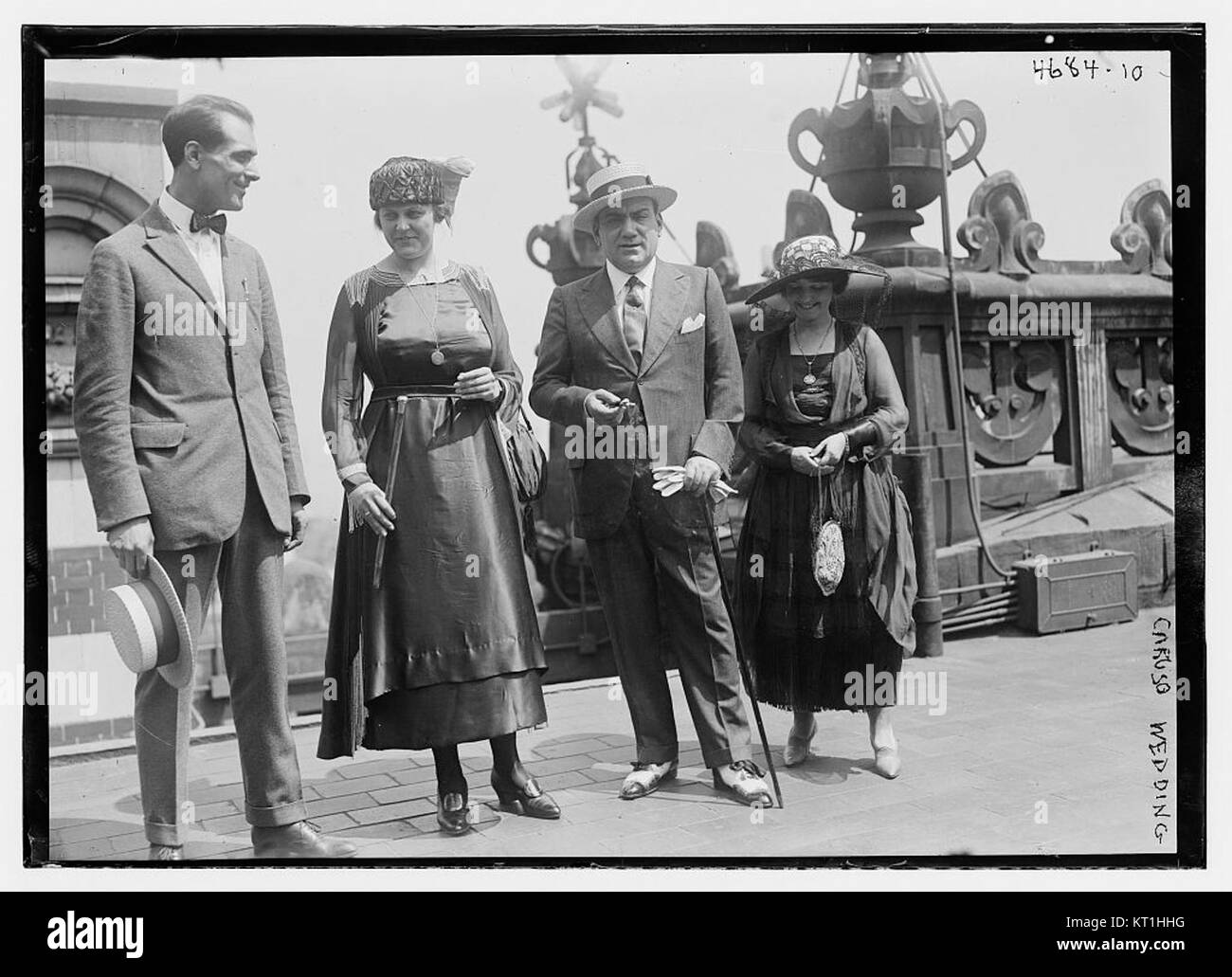 This image captures a wedding ceremony featuring a Caruso family member ...