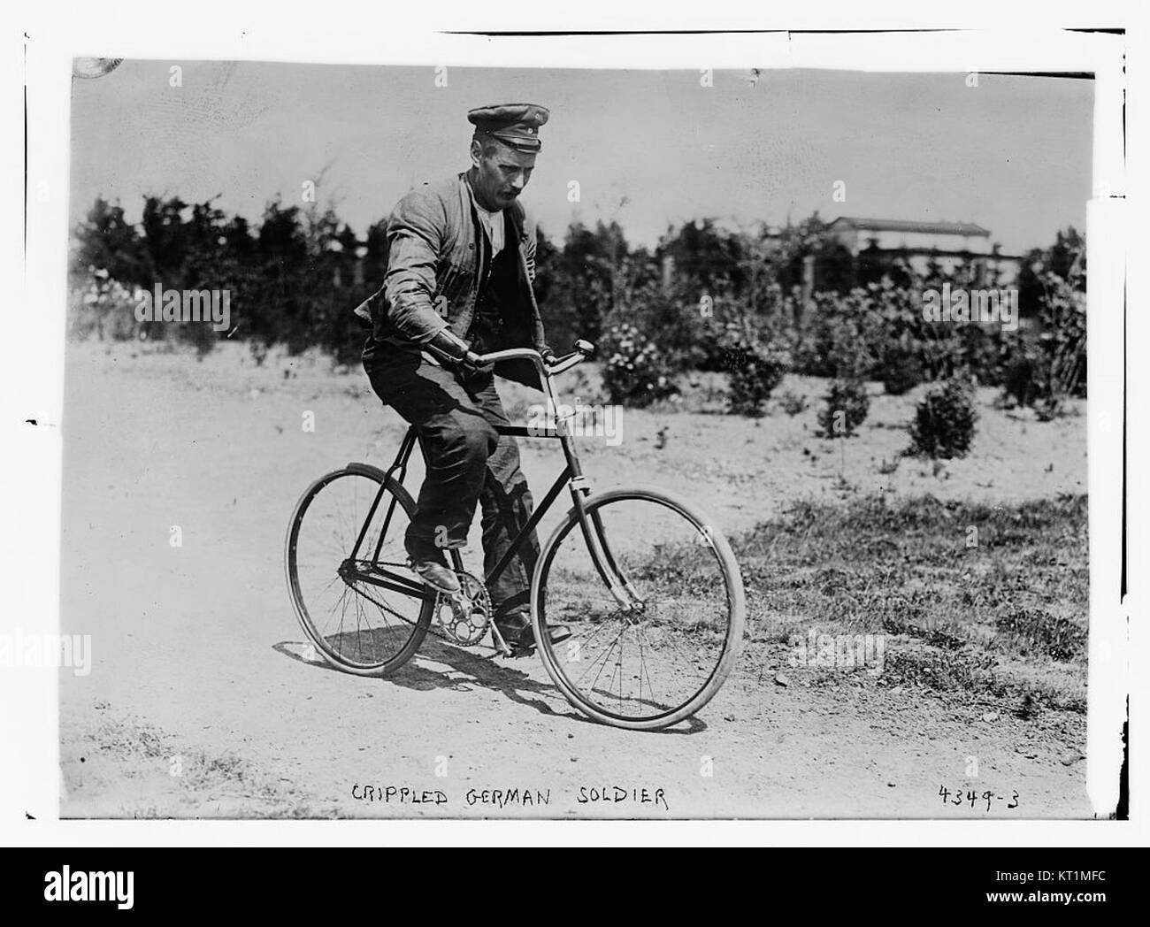 Crippled German soldier (on bicycle) (22211914854 Stock Photo - Alamy
