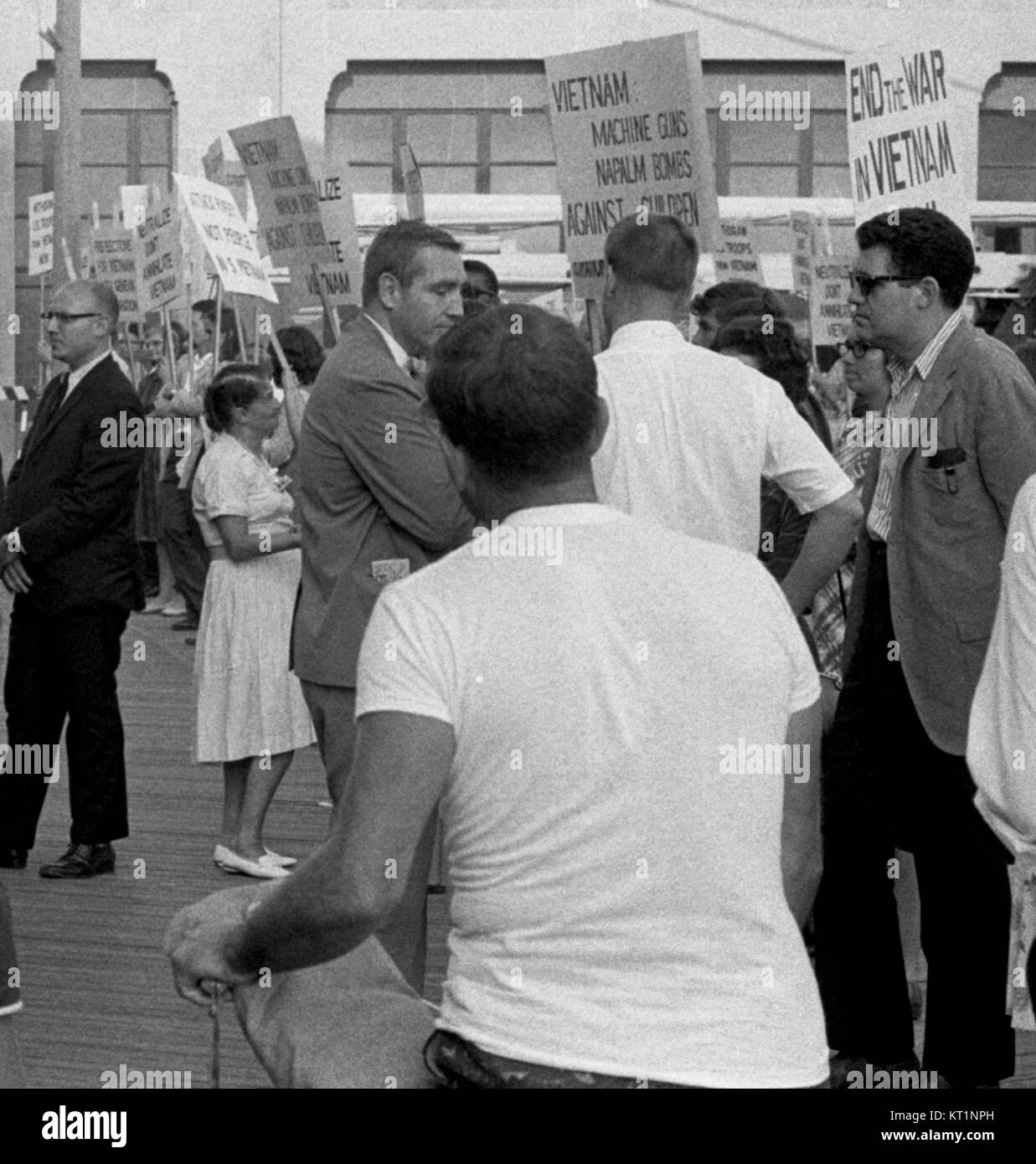 This image captures anti-Vietnam War demonstrators holding signs during ...