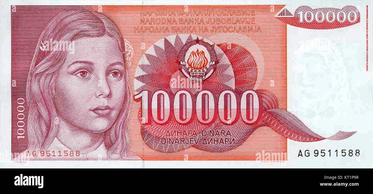 A Dinar note with a value of 100,000, representing the currency and ...