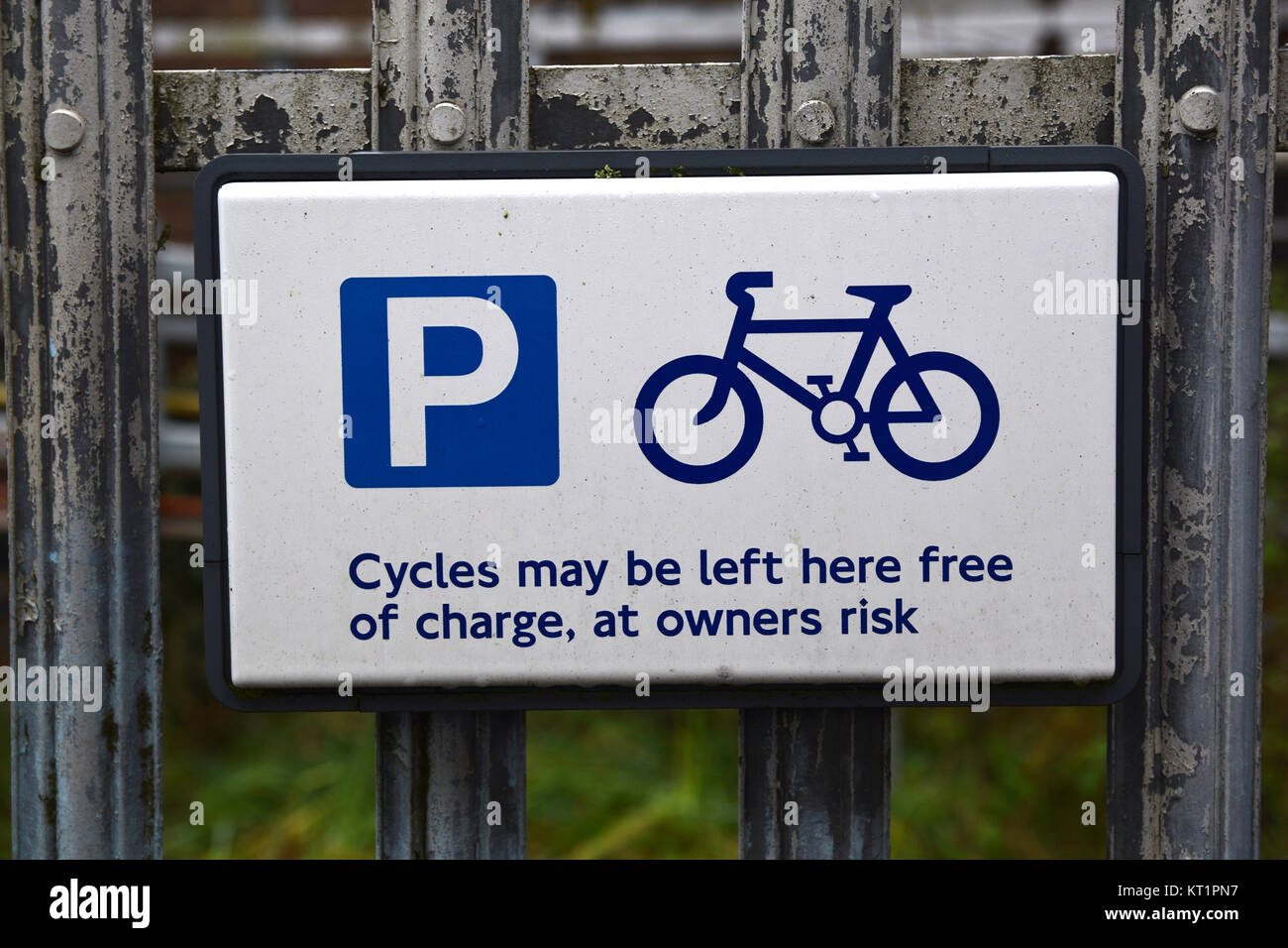 Blue and white cycle parking sign on a steel fence Stock Photo - Alamy