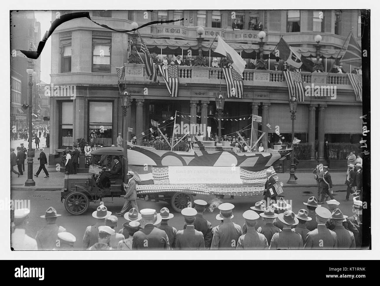 The image captures a vibrant 4th of July parade, showcasing the ...